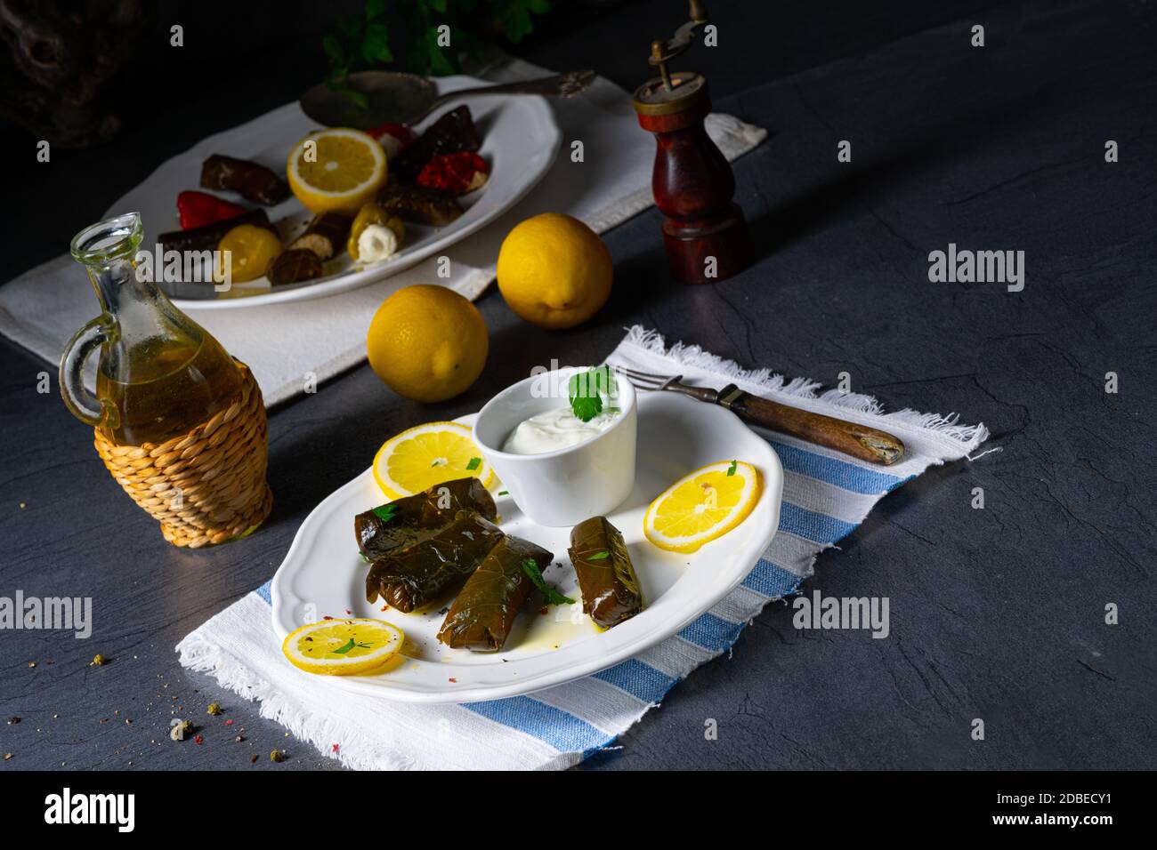 Dolmades - stuffed grape leaves the Greek way Stock Photo - Alamy