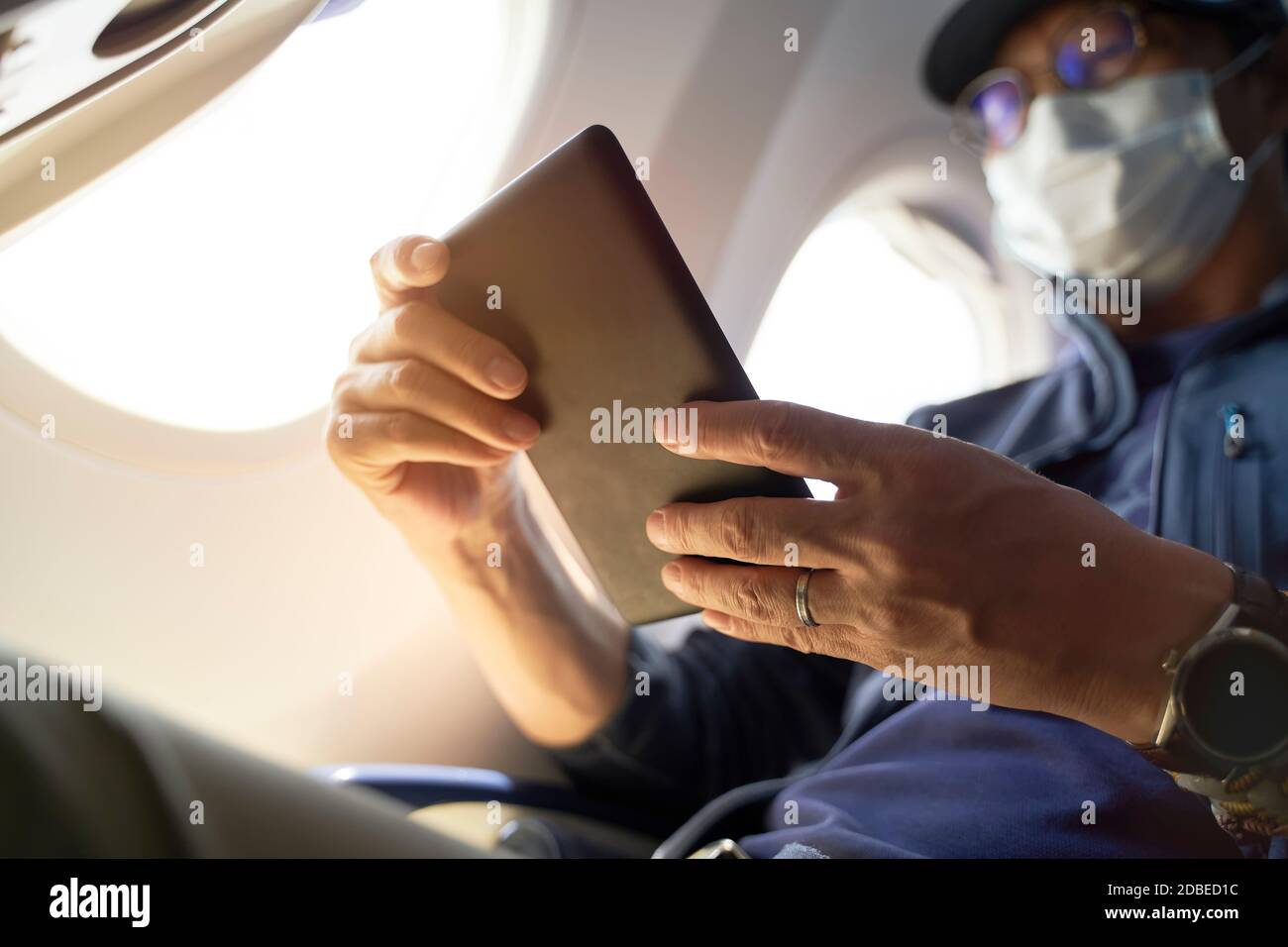 Person flying in plane hi-res stock photography and images - Alamy