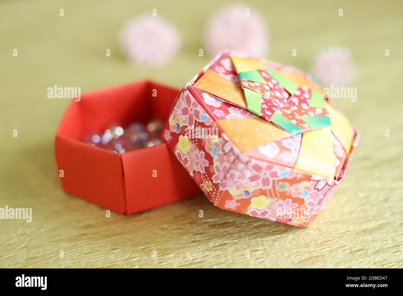 Colorful Japanese patterned hexagonal origami box with lid Stock Photo ...