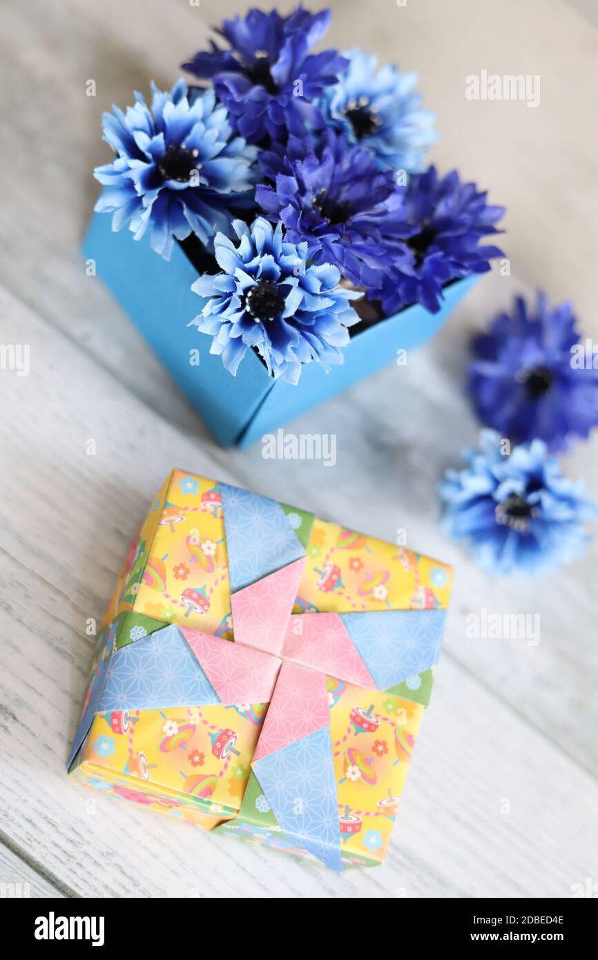 Colorful Japanese patterned square origami box with lid Stock Photo - Alamy