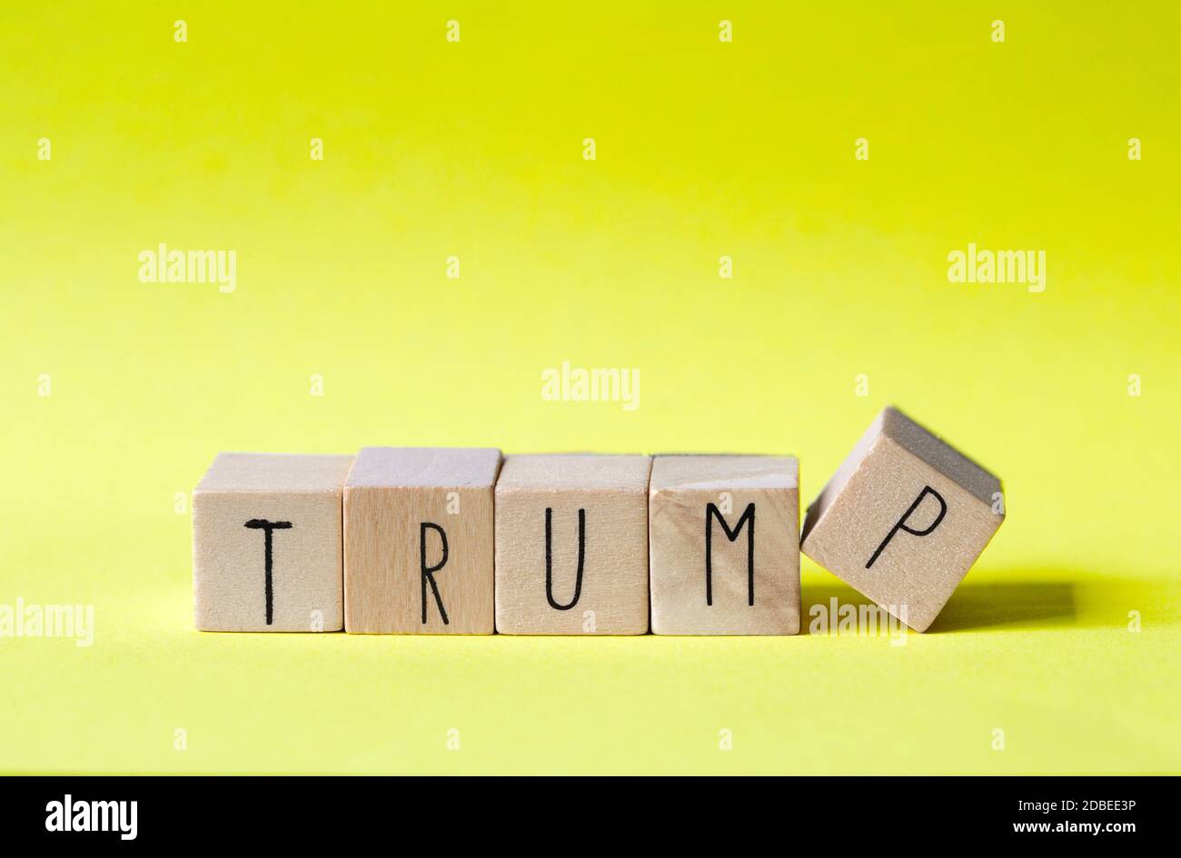Wooden cubes with the word Trump on Yellow background, President ...
