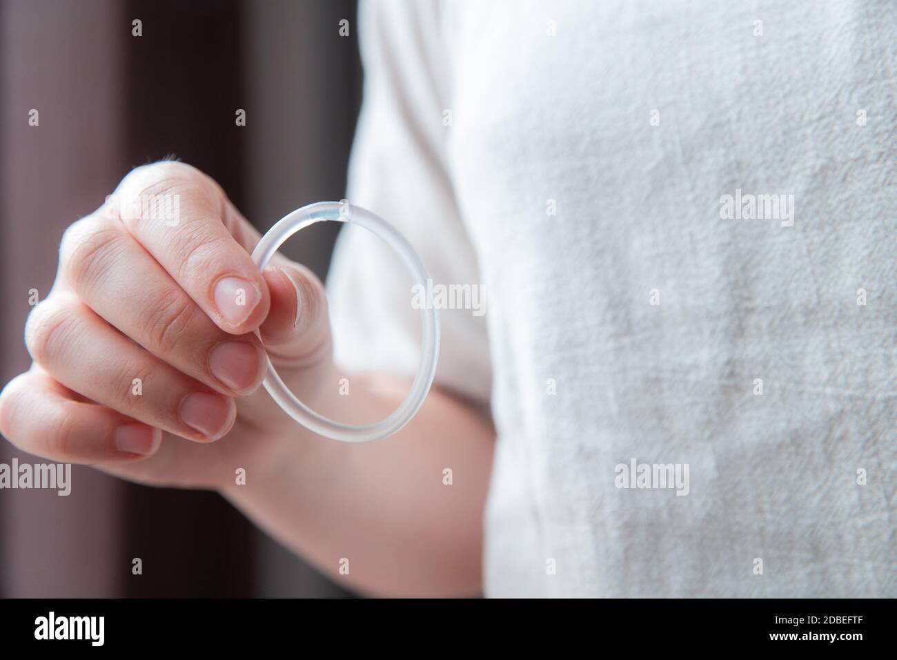 Woman's hand holding a birth control ring, vaginal ring for ...