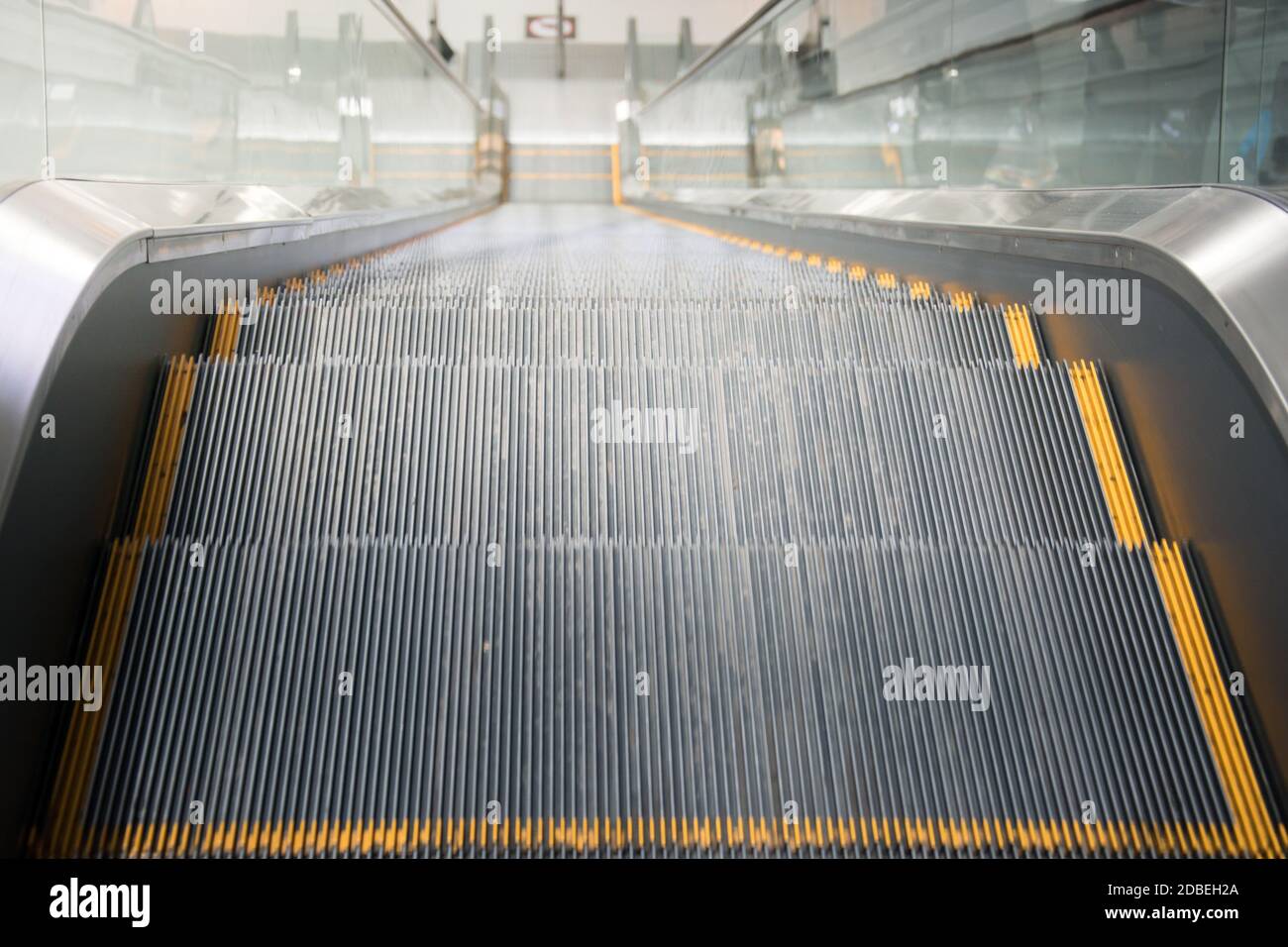 Escalator stairs in station Stock Photo - Alamy