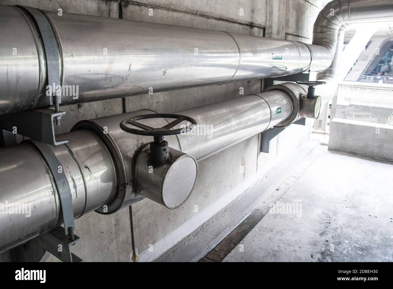 cables and piping as found inside of a thermal power Stock Photo - Alamy