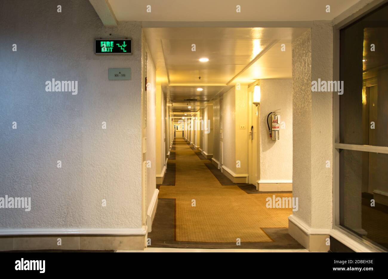 emergency fire exit outlet sign and door Stock Photo - Alamy