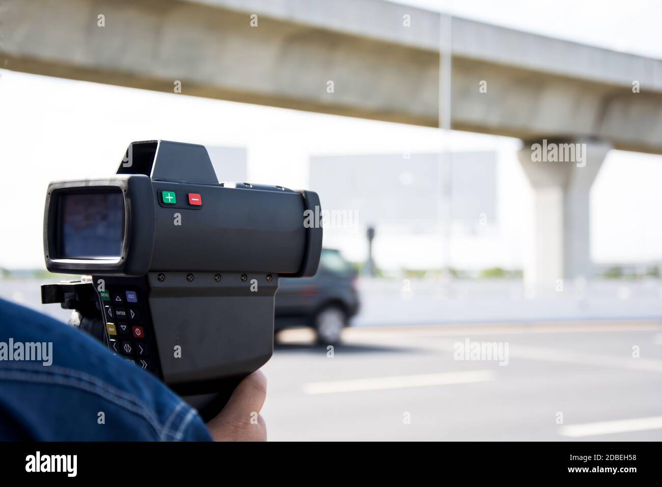 catch speeding drivers with a radar gun Stock Photo - Alamy