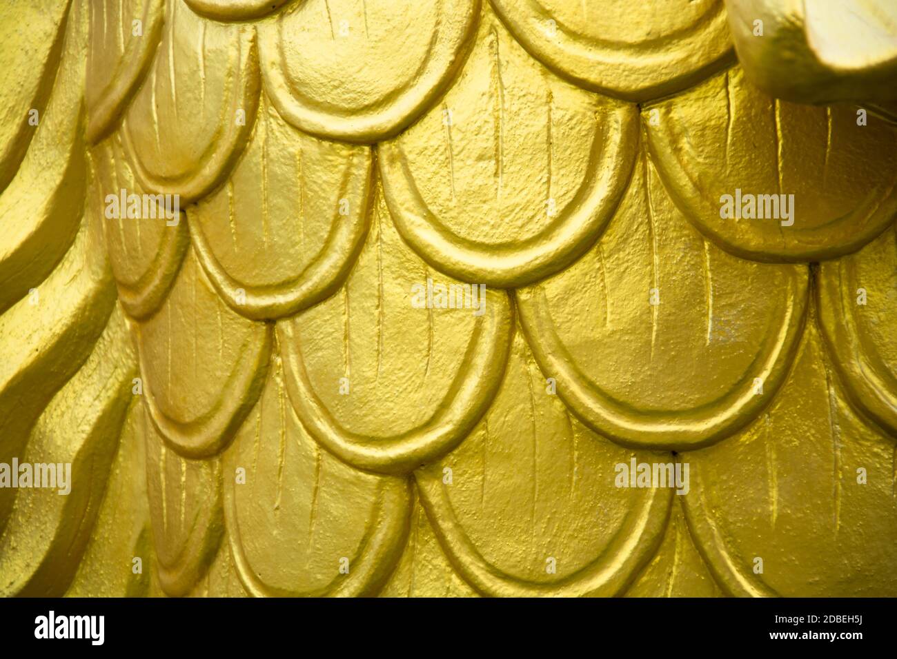 Gold carp scales statue Stock Photo - Alamy