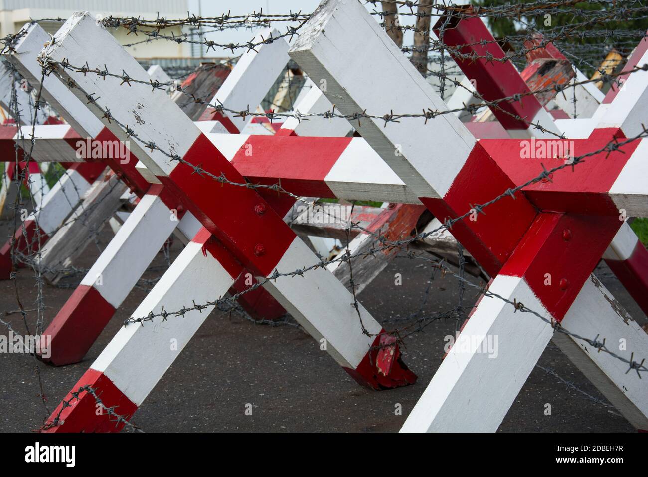 Barbed wire fence block the way Stock Photo - Alamy