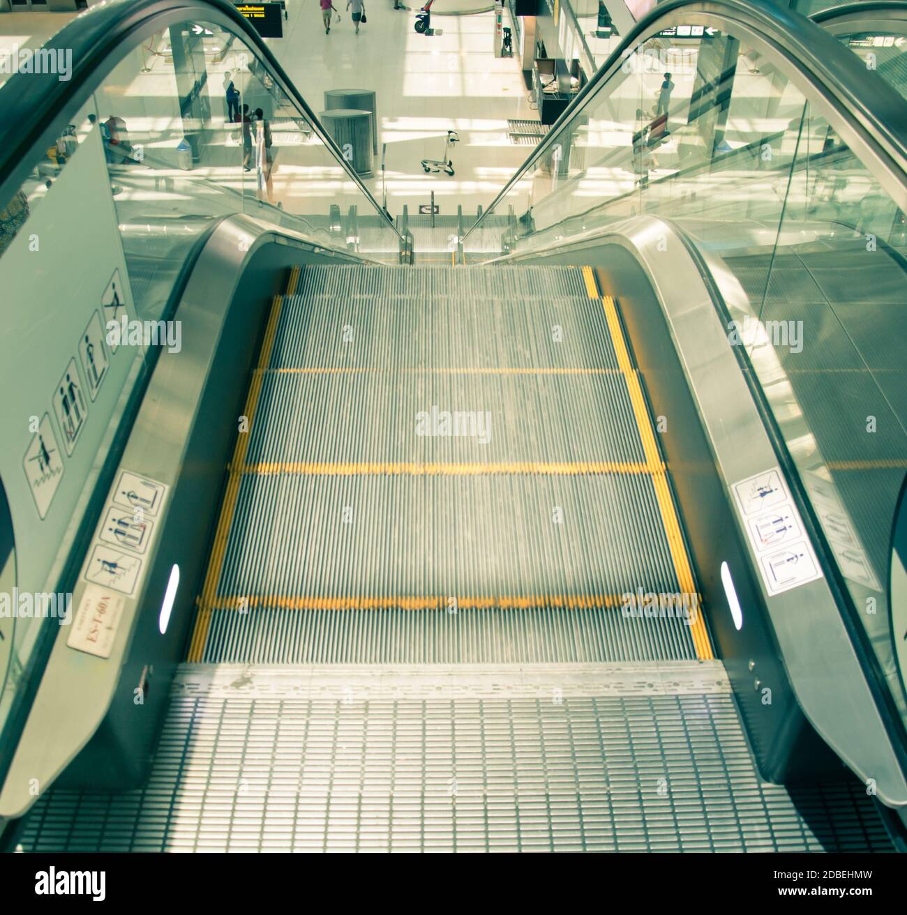 Escalator stairs in station color Filter Stock Photo - Alamy