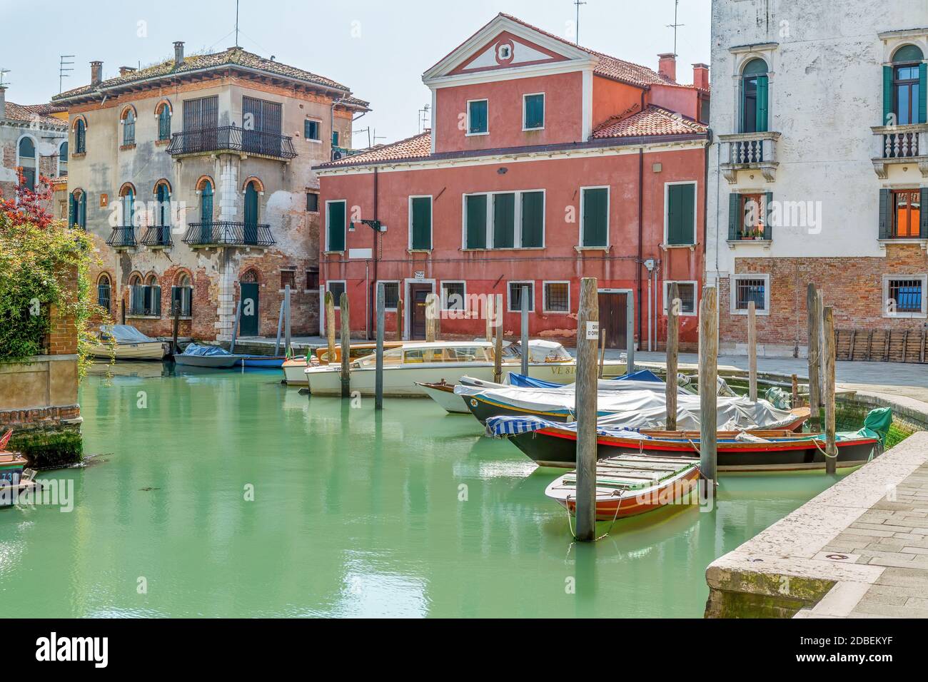 Small boats stand in the middle of Venice at a dock Stock Photo - Alamy