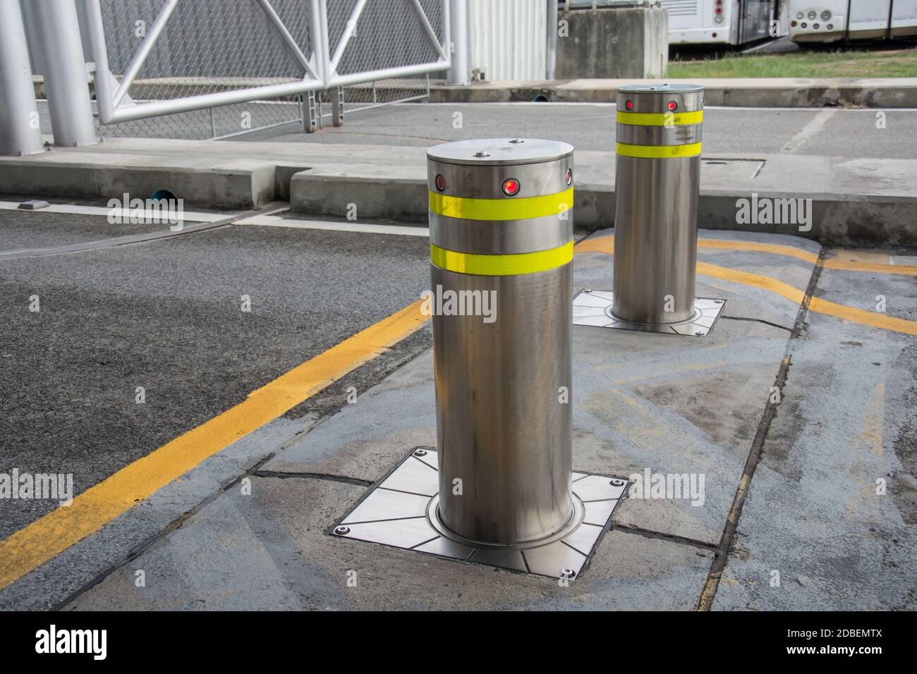 bollards with Security at the gate Stock Photo - Alamy