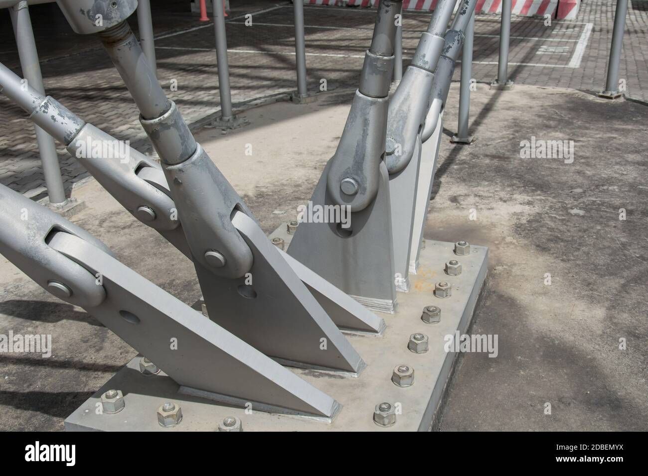 Steel column support with bolts and nuts Stock Photo - Alamy