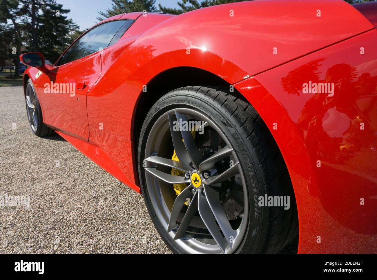 Close up rear view of the wheel and arch on a red Ferrari 488 GTB ...