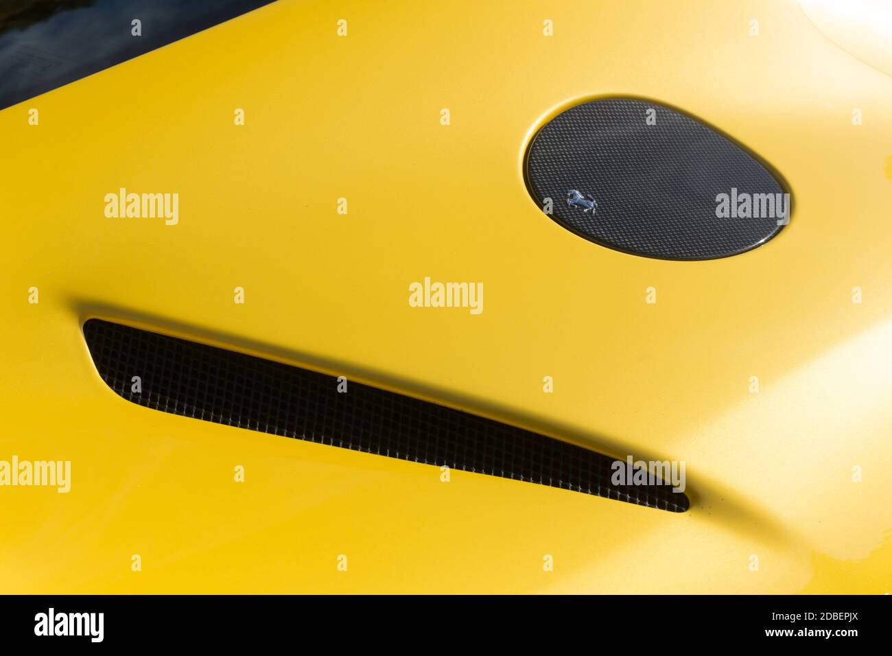Close up detail of a vent and carbon fuel filler cap on a yellow ...
