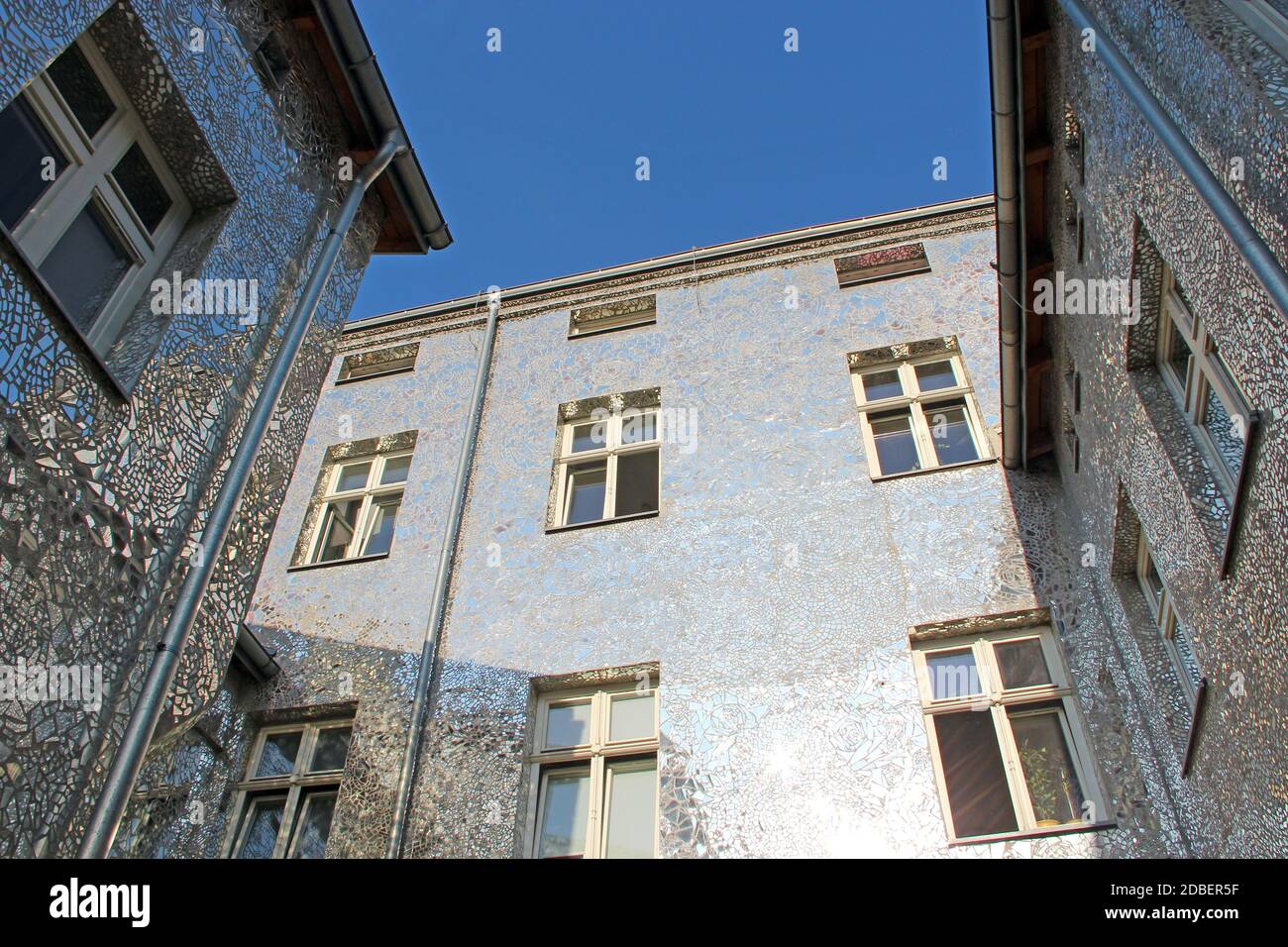 Building with mirrored walls. Facade of building made of mirror ...
