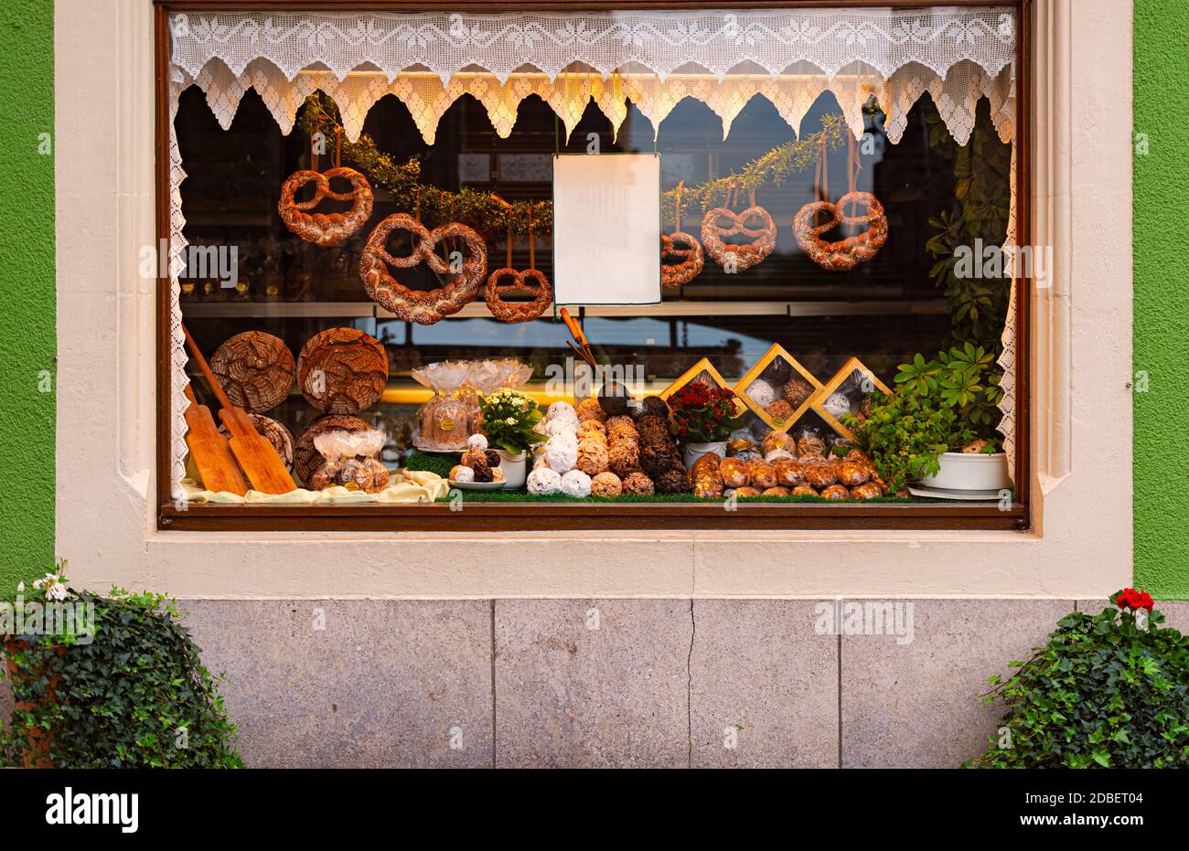 Shop window with traditional bakery in old city street with traditional ...