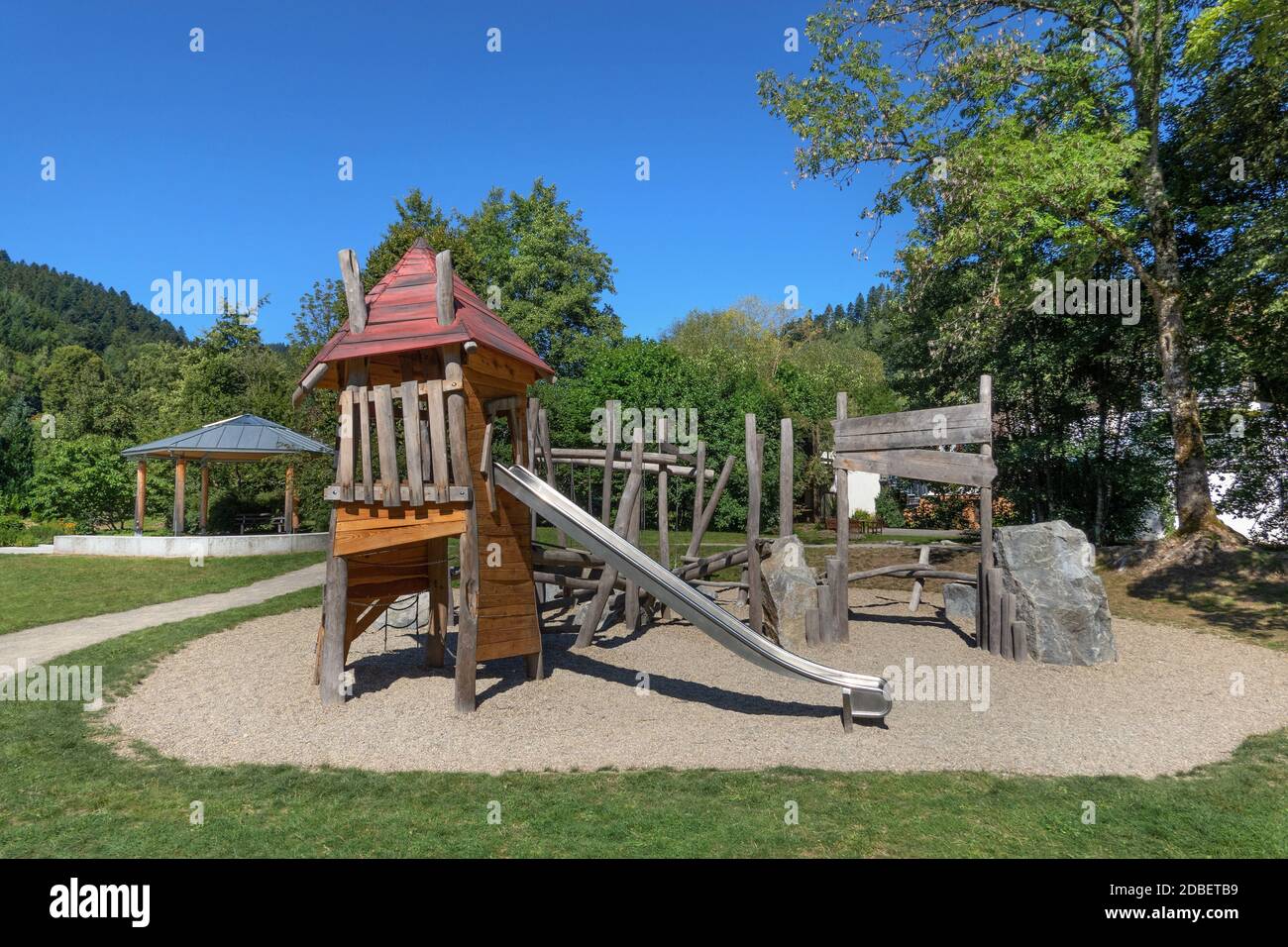 Children's playground in a park in late summer Stock Photo - Alamy
