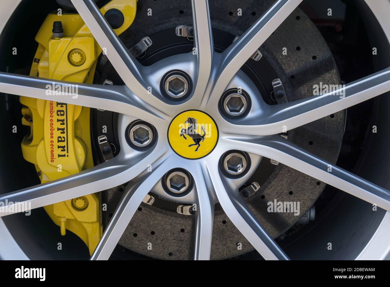 Close up of the forged silver wheel on a rosso corsa Ferrari 488 Pista ...