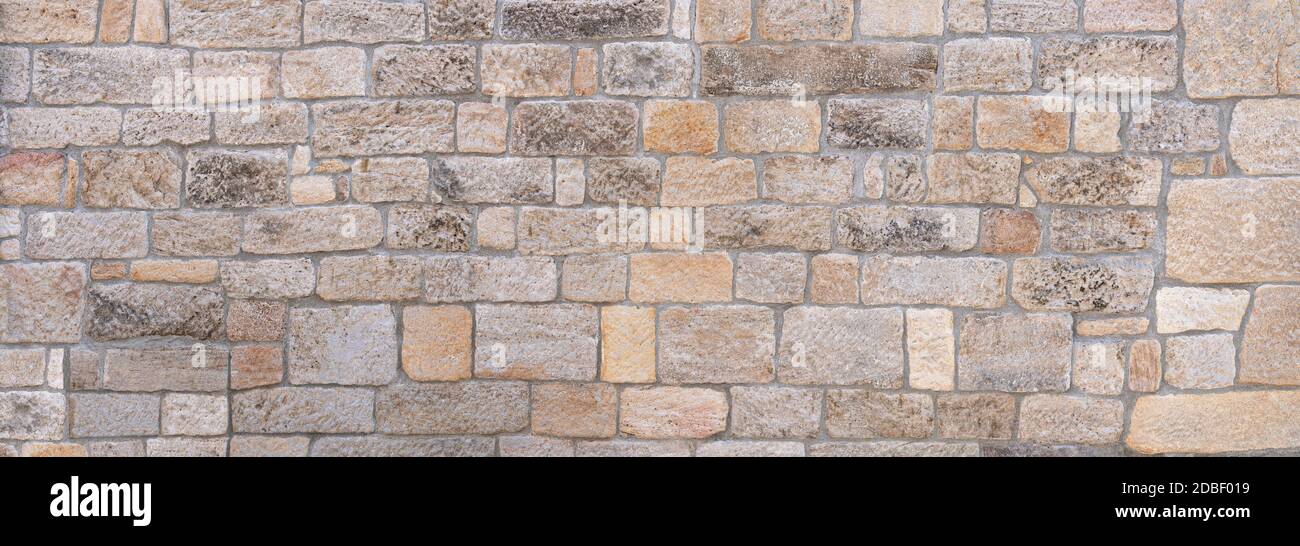 Panorama of a bright, old, partly weathered stone wall Stock Photo - Alamy