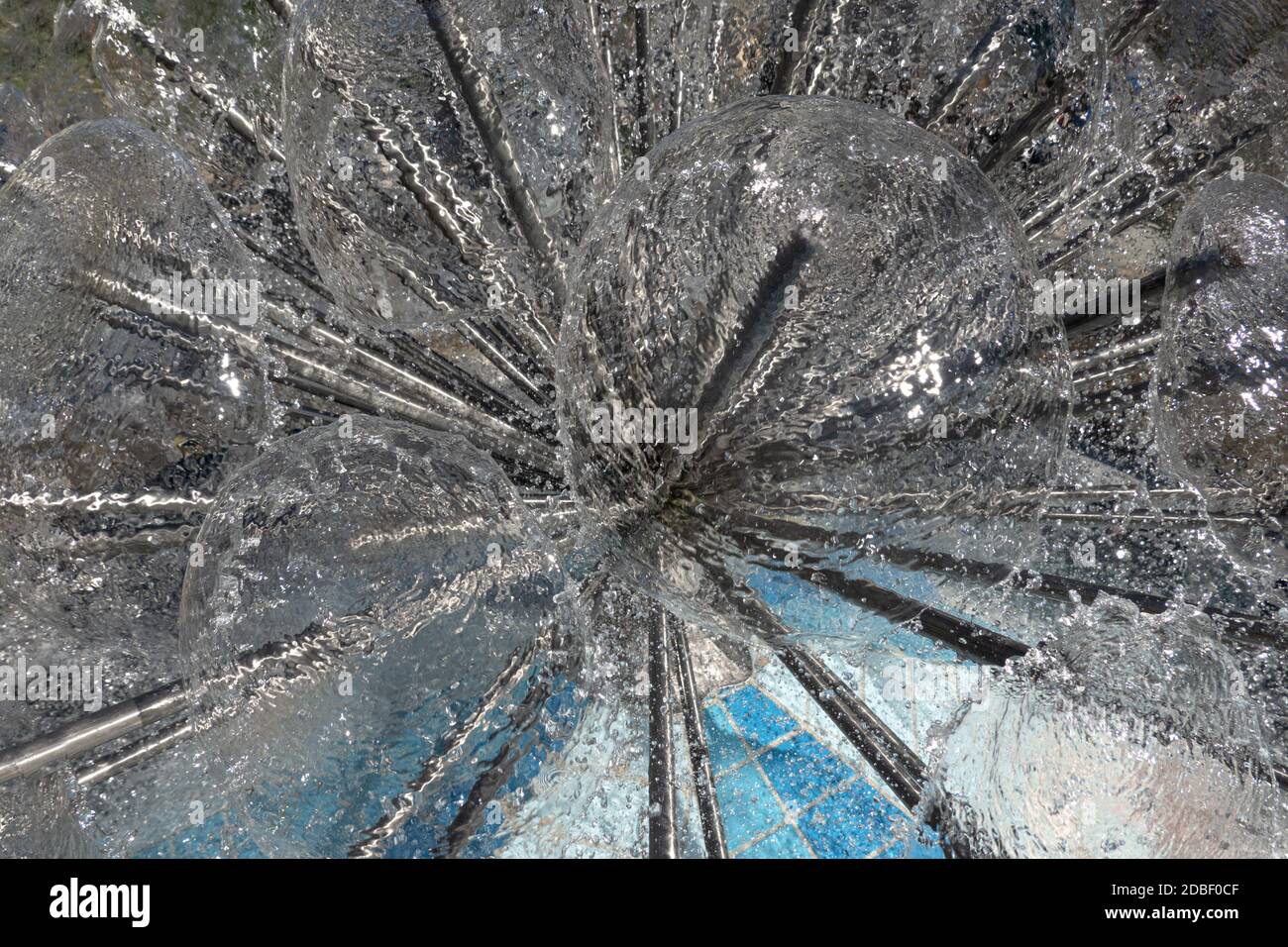 Detail of a water feature at star-shaped metal bars Stock Photo - Alamy