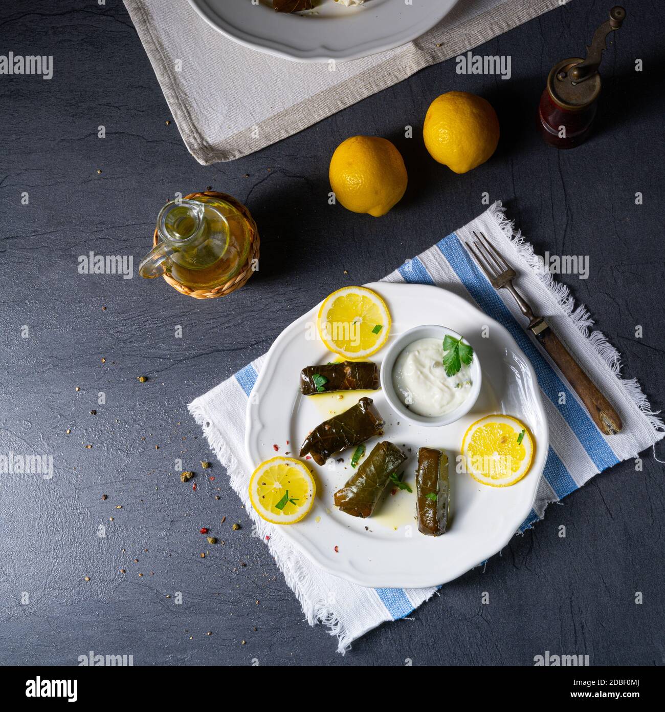 Dolmades - stuffed grape leaves the Greek way Stock Photo - Alamy