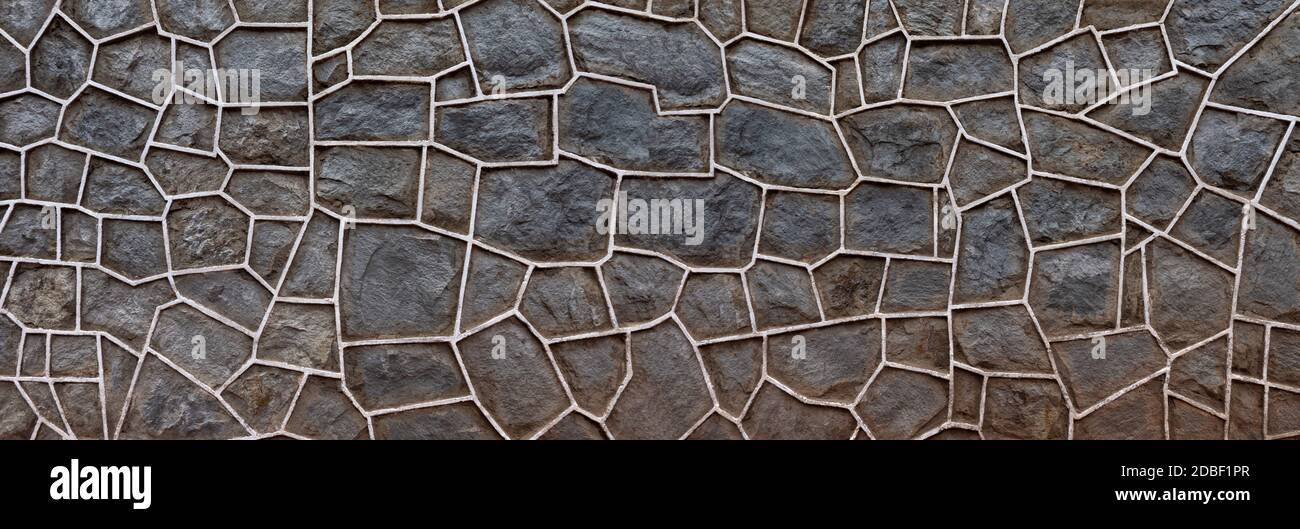 Old abstract net-like design on a house wall - panorama Stock Photo - Alamy