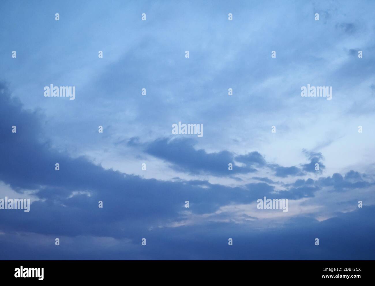 dramatic blue sky with clouds useful as a background Stock Photo - Alamy