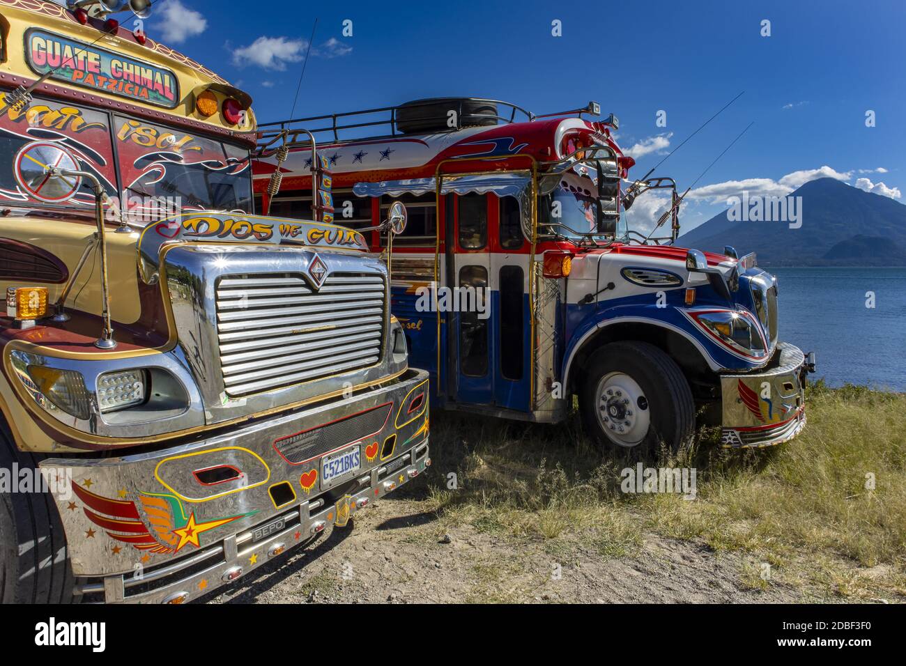 chicken bus at lake atitlan in guatemala Stock Photo - Alamy