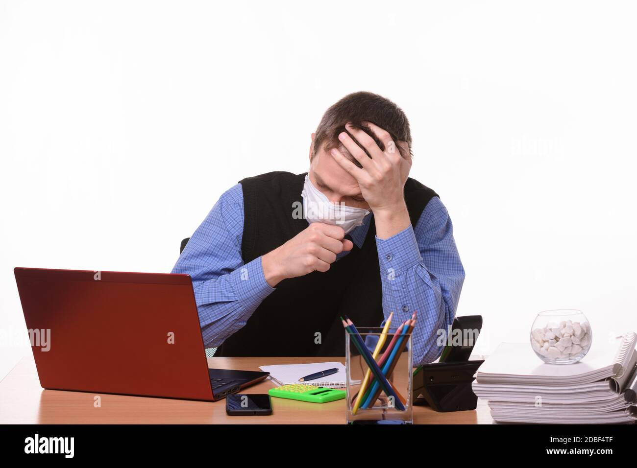 Ill office worker coughing in the workplace Stock Photo - Alamy