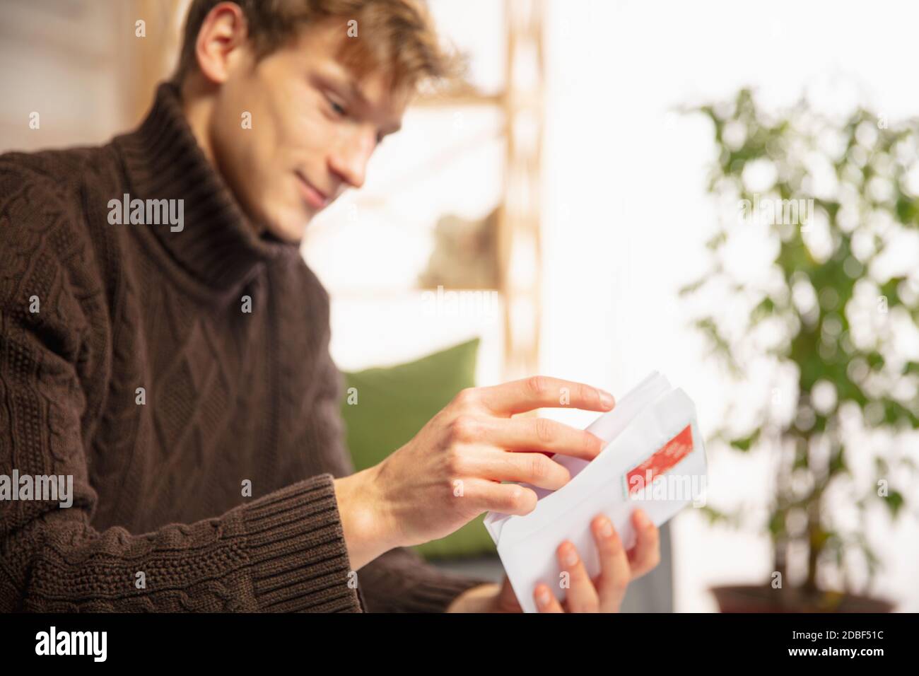 Recieving a card hi-res stock photography and images - Alamy