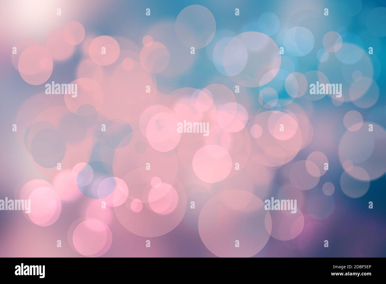 Abstract bright spring or summer landscape texture with natural light pink orange bokeh lights ...