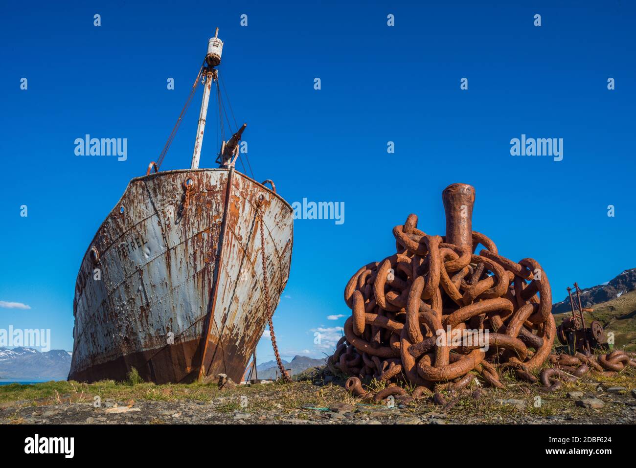 Old whaler with harpoon beside rusty chain Stock Photo - Alamy