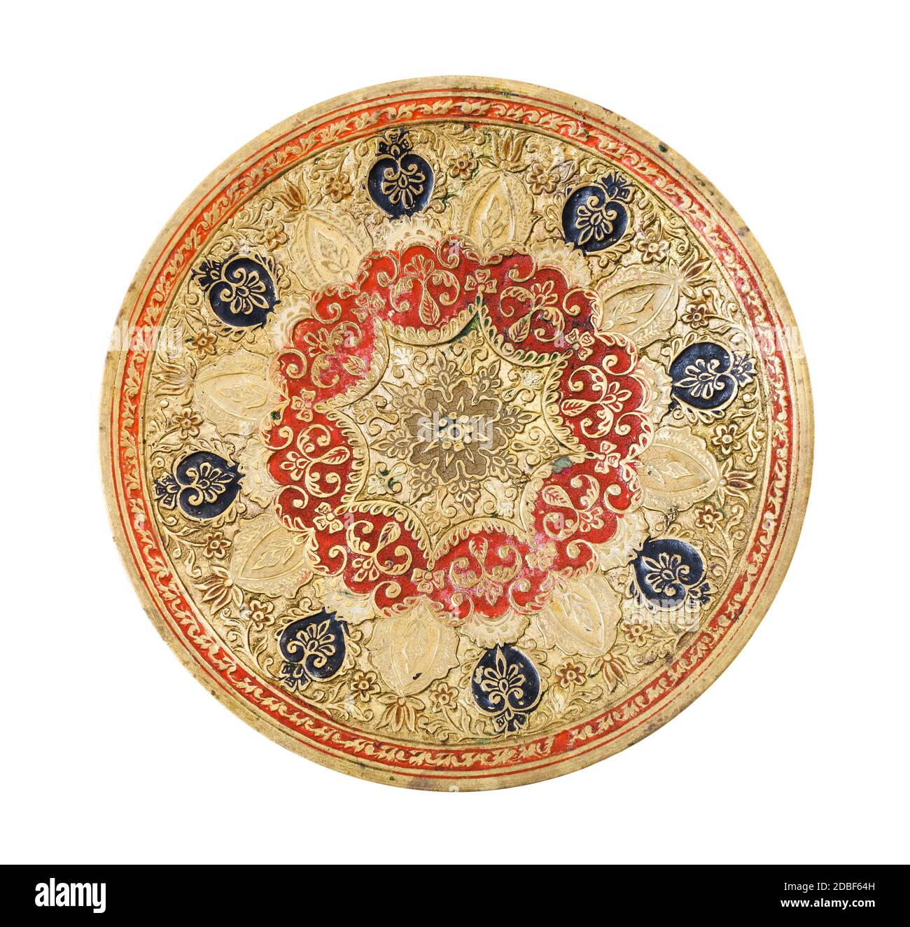 top view of vintage indian handcrafted embossed brass plate isolated on ...