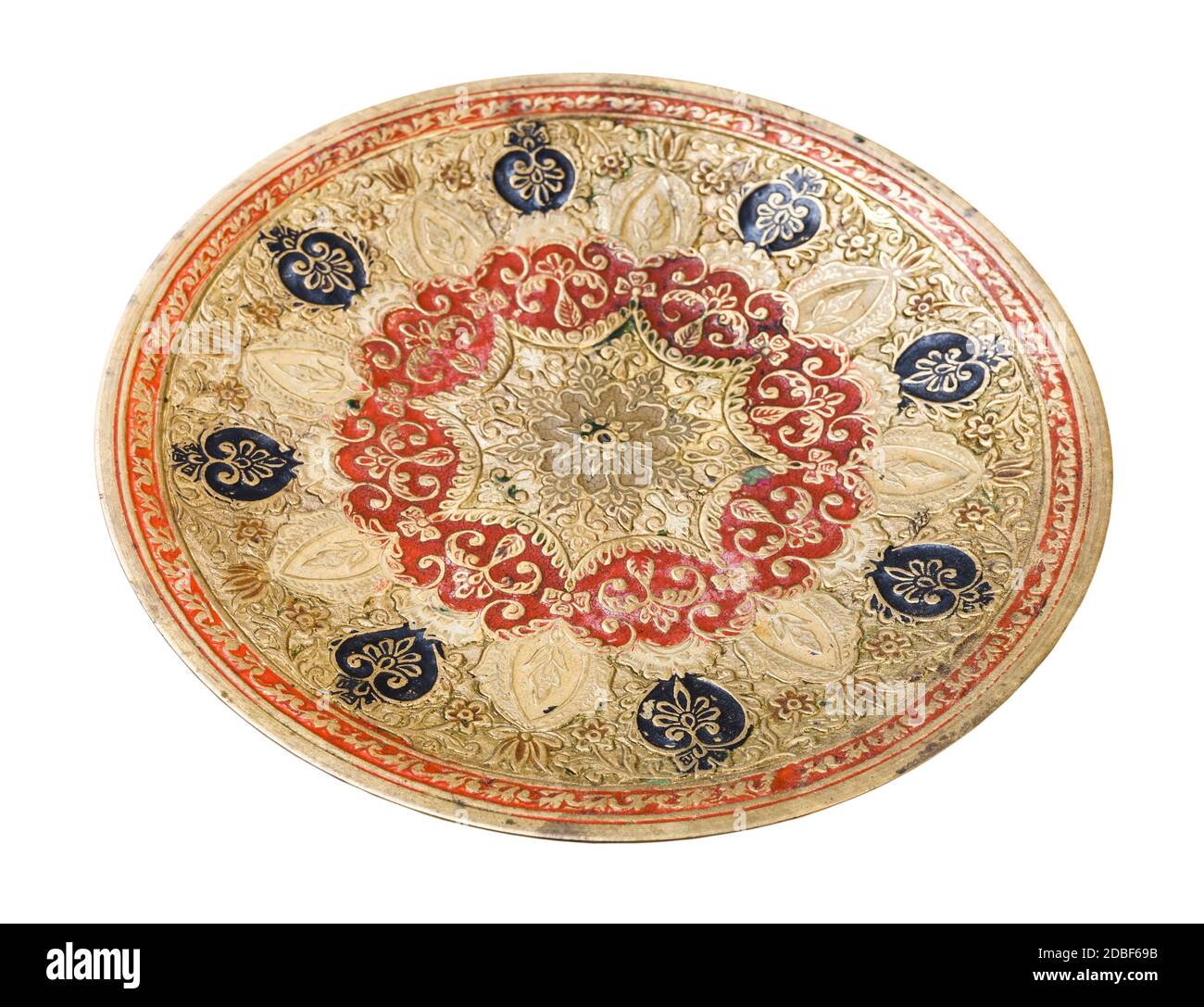 vintage indian handcrafted embossed brass plate isolated on white ...
