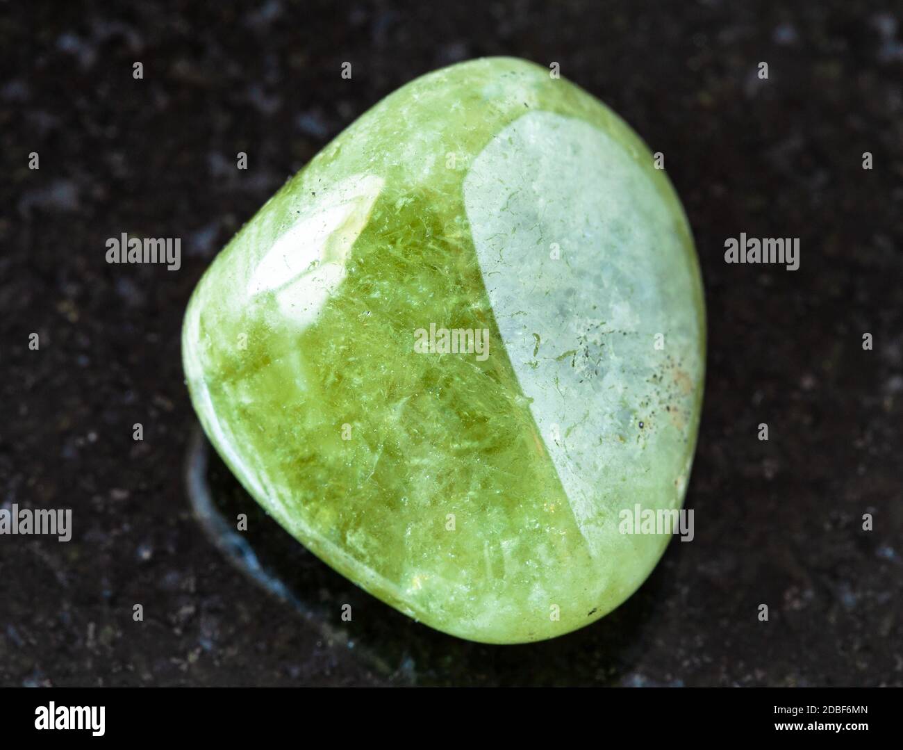 Green garnet natural mineral tumbled specimen hi-res stock photography ...
