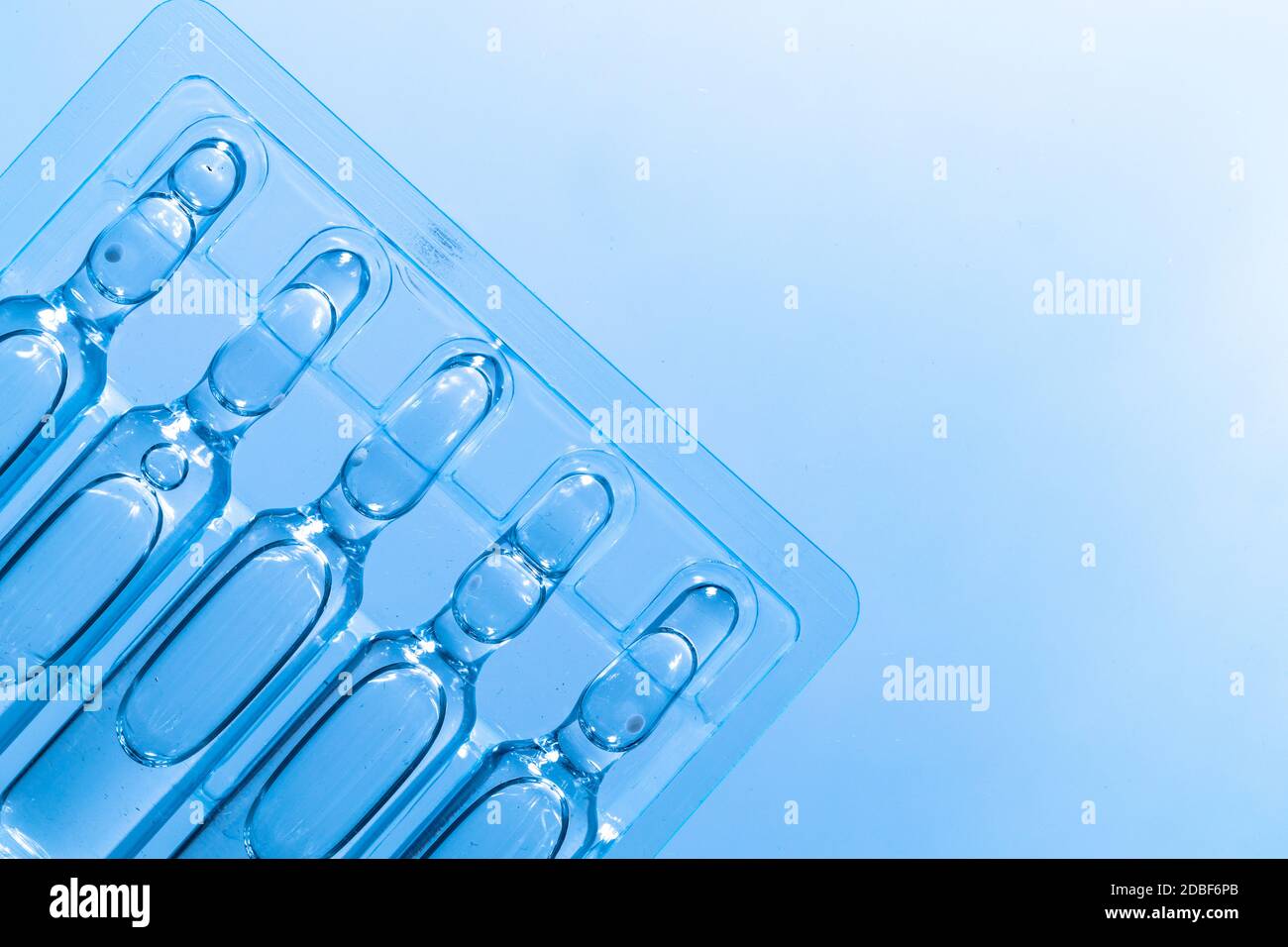 Medical background of ampule vials for injections Stock Photo - Alamy