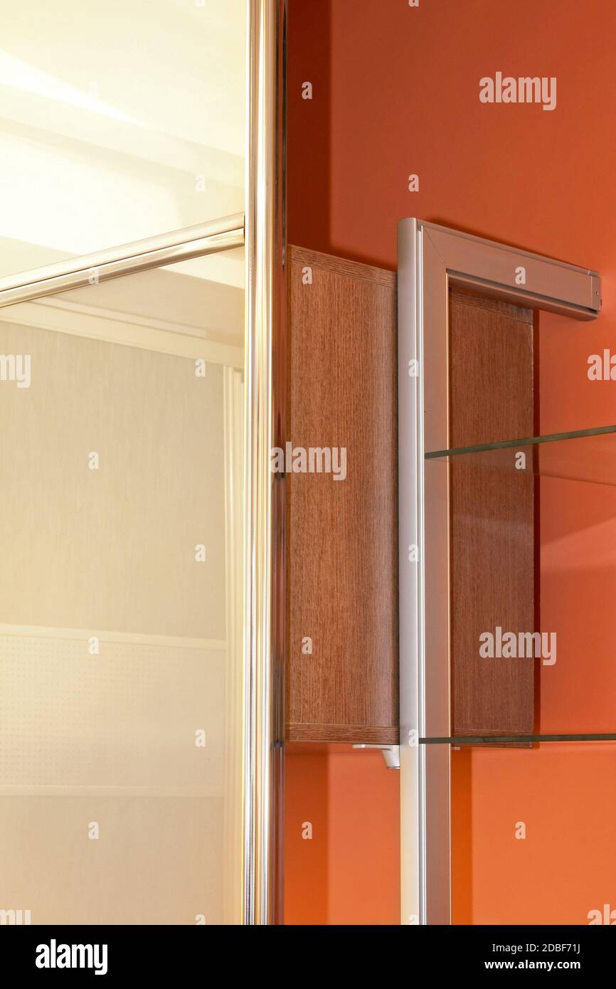 Inside of wardrobe closet with shelf detail Stock Photo - Alamy