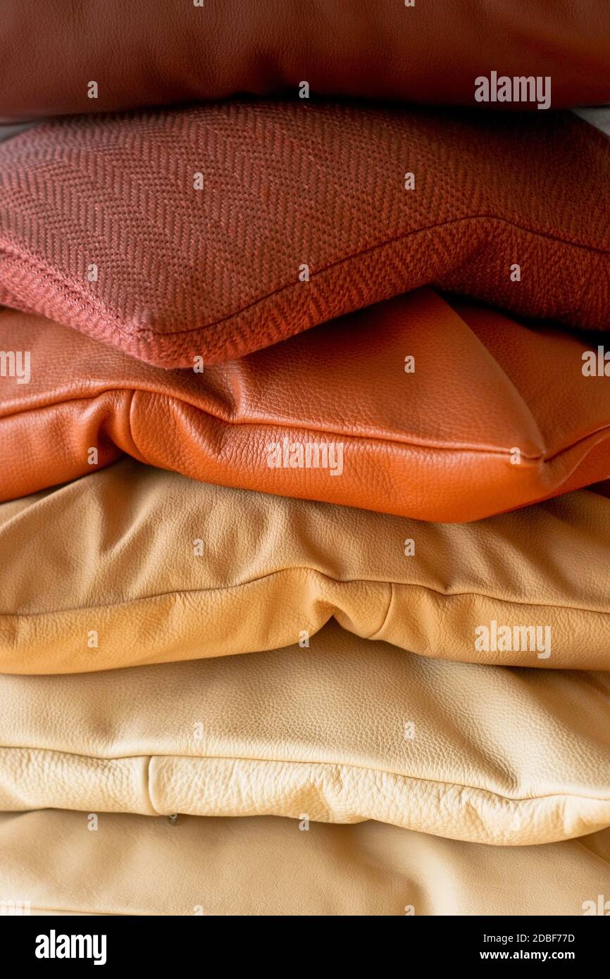 Ruby decorative pillows made from real leather Stock Photo - Alamy