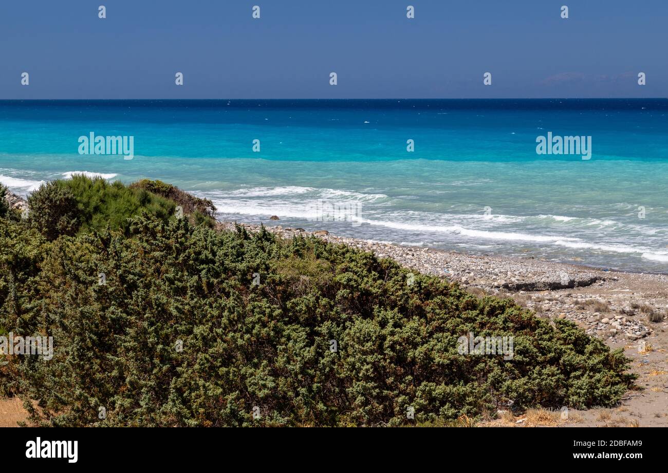 Gravel / pebble beach at the southwest coast of Rhodes island near ...