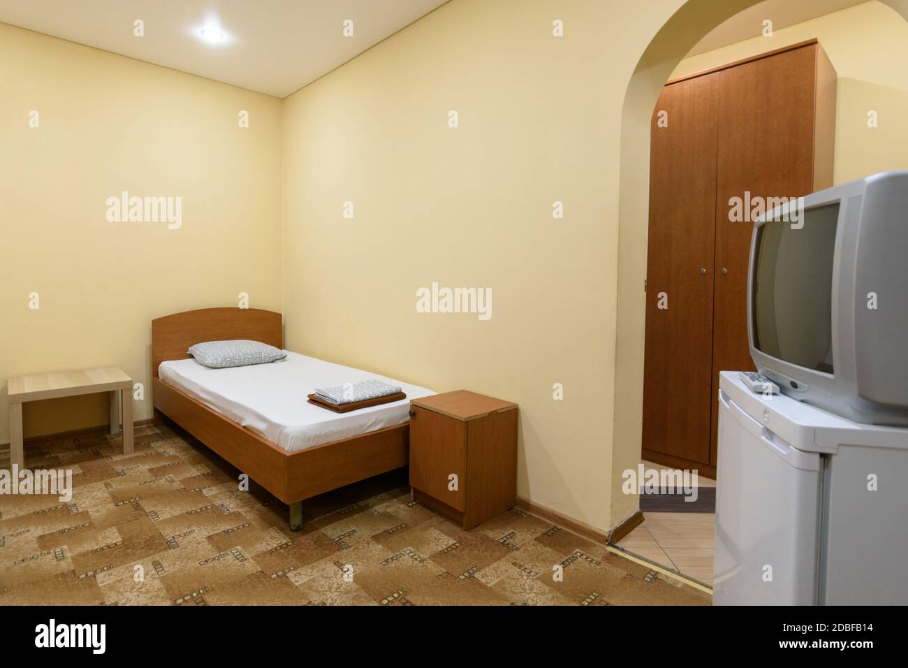 The interior of a small budget hotel room Stock Photo - Alamy