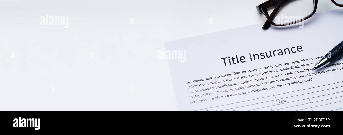 Title Insurance Contract Paper And Application Form Stock Photo - Alamy