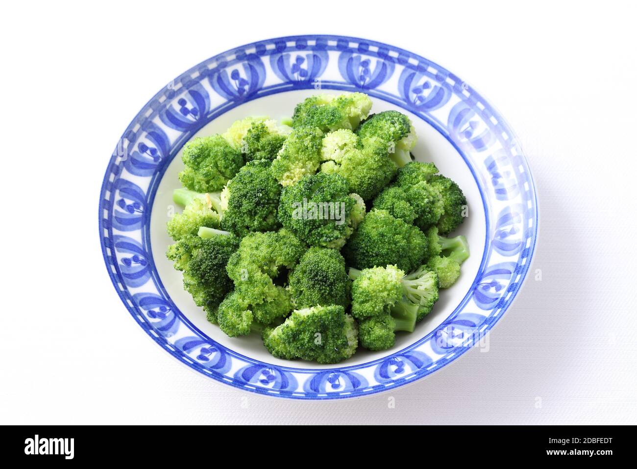 Steamed broccoli, white background hi-res stock photography and images ...