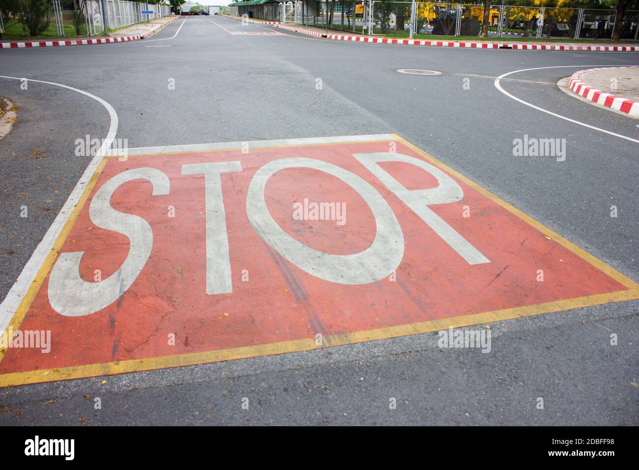 Traffic signs stop on the on road Stock Photo - Alamy