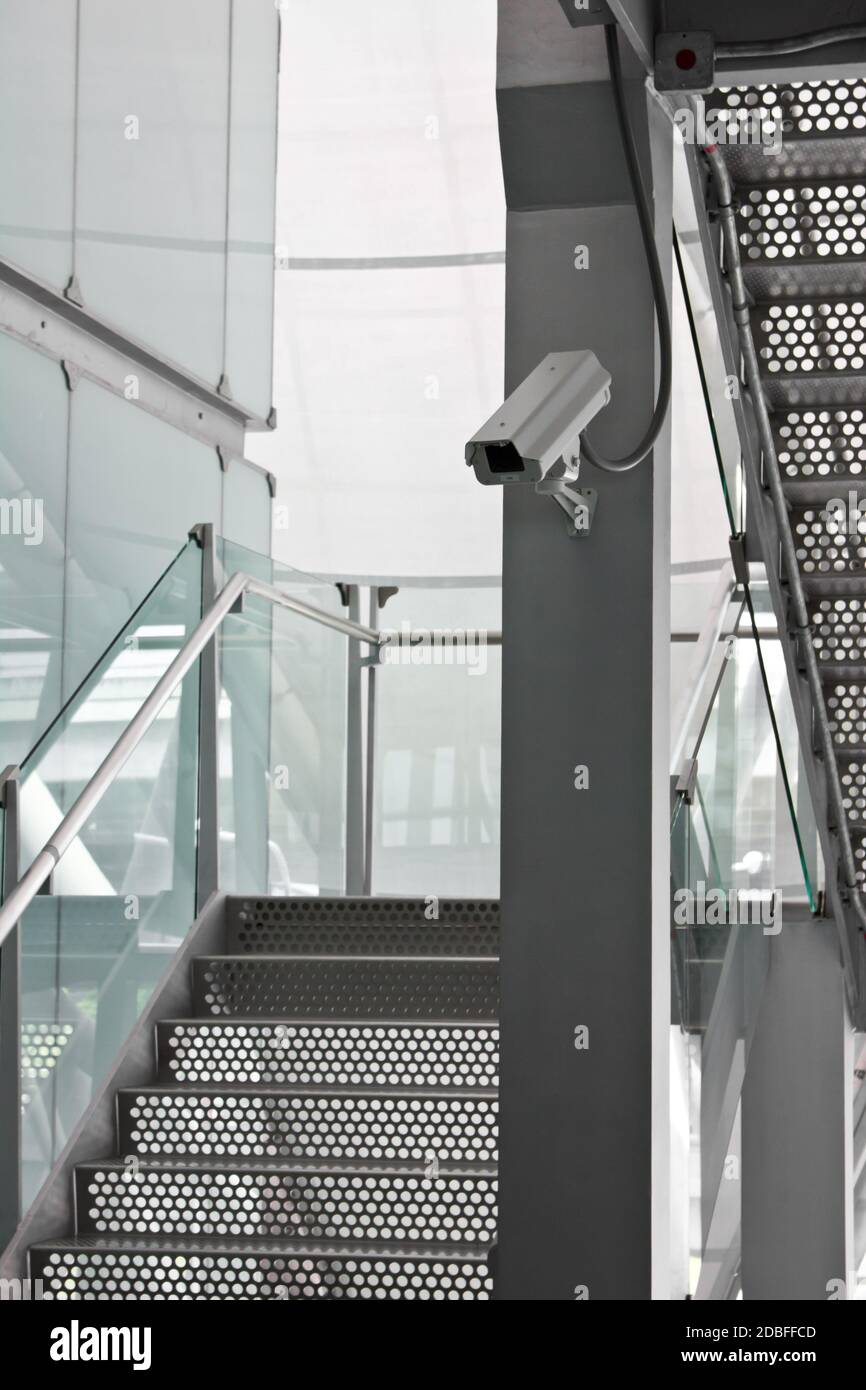 Security Camera CCTV on staircase location building Stock Photo - Alamy