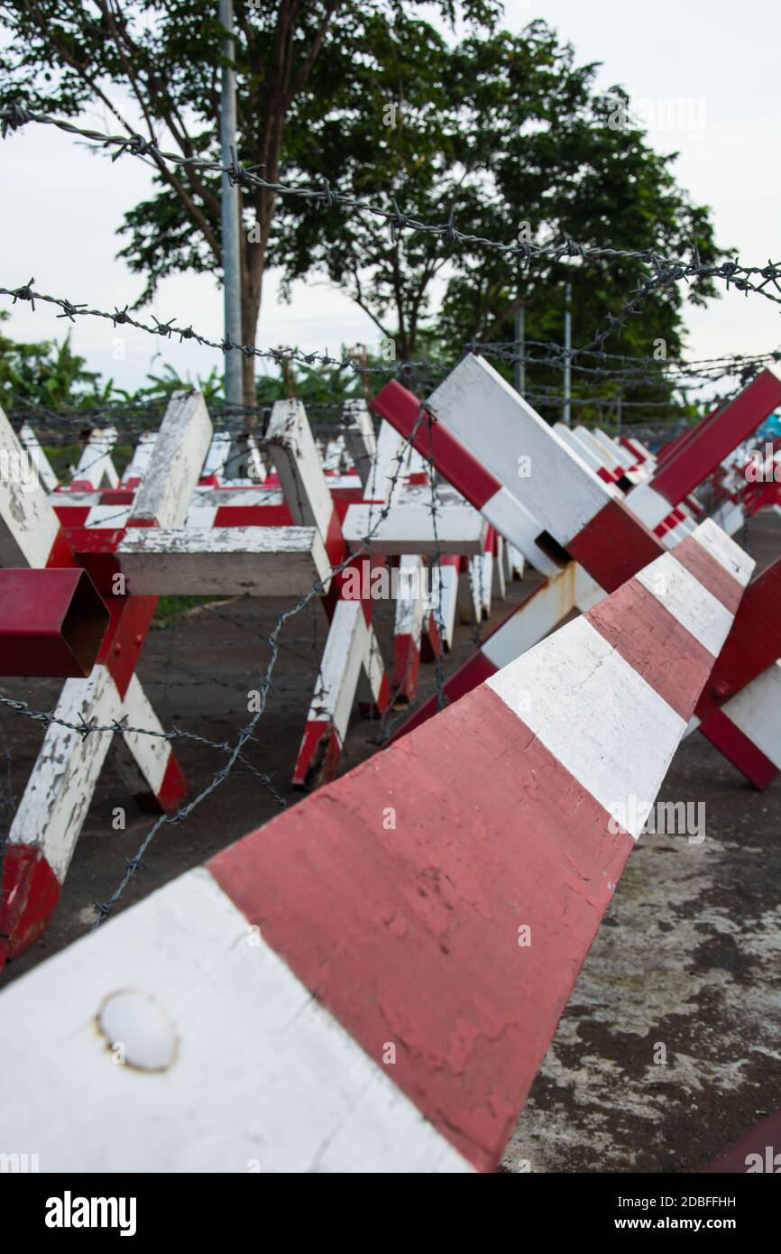 Barbed wire fence block the way Stock Photo - Alamy