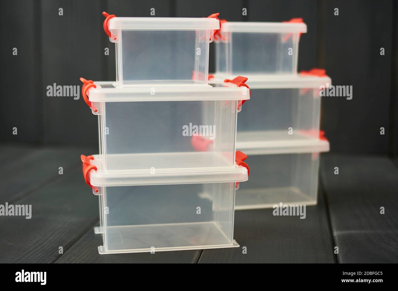 Clear plastic boxes on shelf hi-res stock photography and images - Alamy