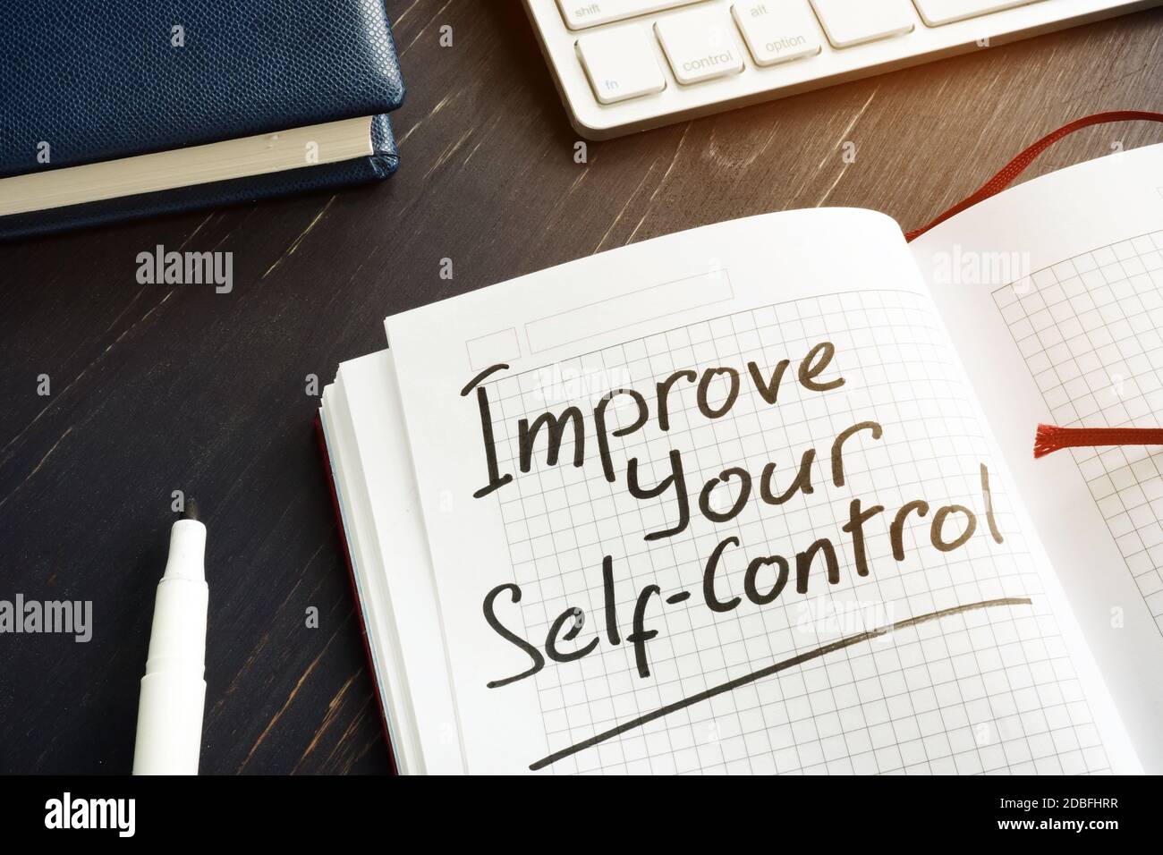Improve Your Self-Control sign in the red notebook Stock Photo - Alamy