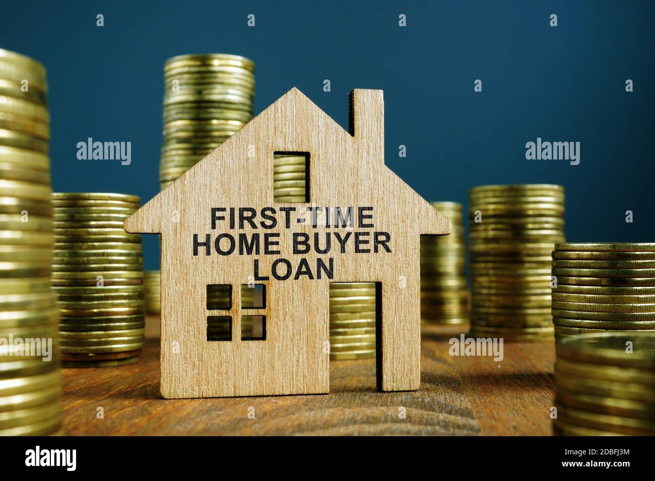 First Time Home Buyer Loan sign on model of house Stock Photo - Alamy