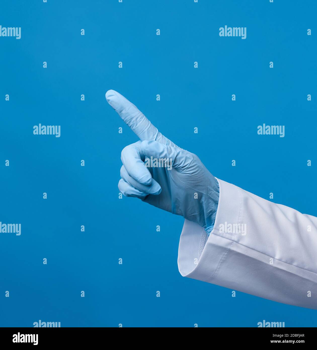 medic woman in white coat, wearing in blue sterile gloves, showing hand ...