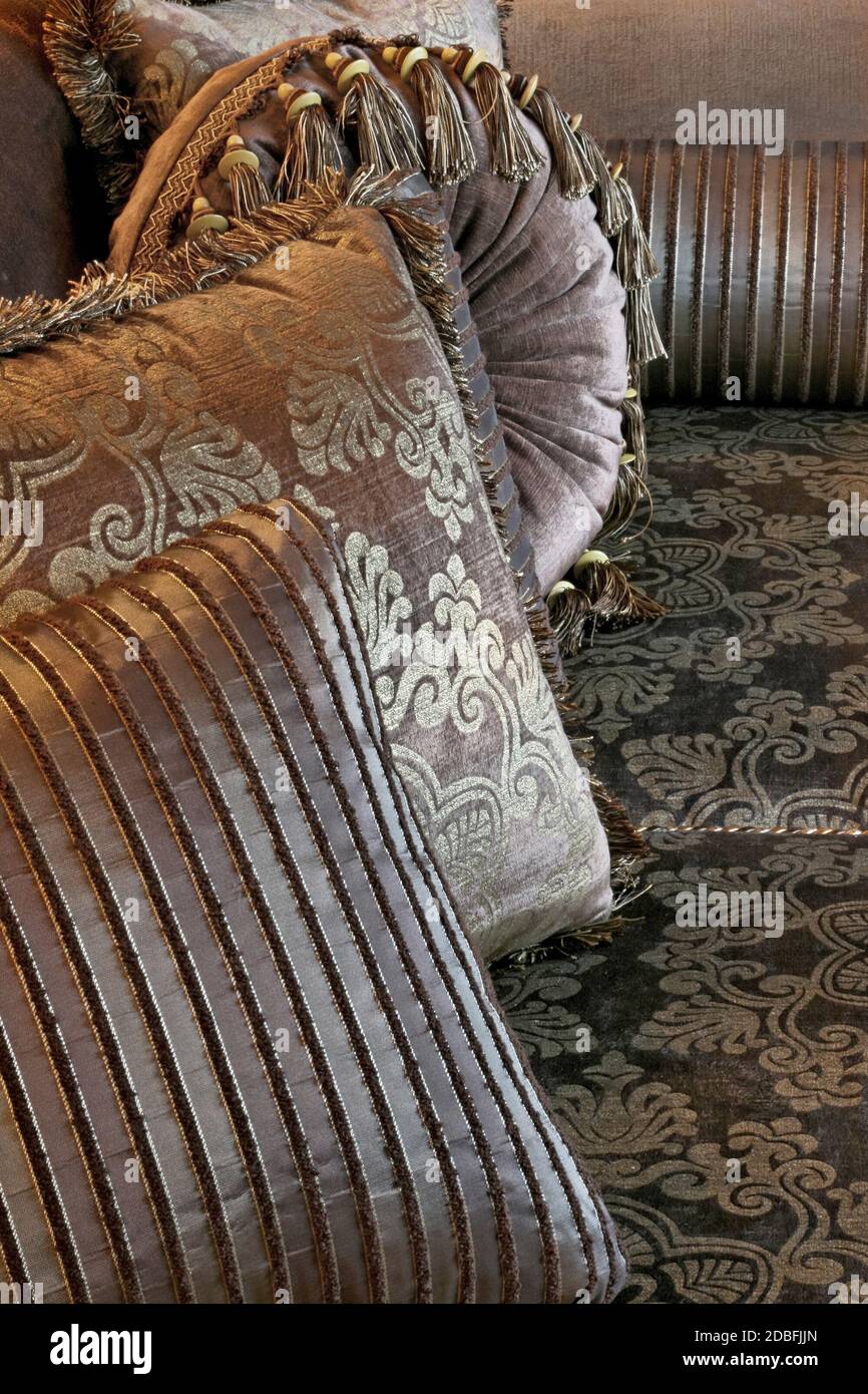 Bunch of pillows in line on the sofa Stock Photo - Alamy